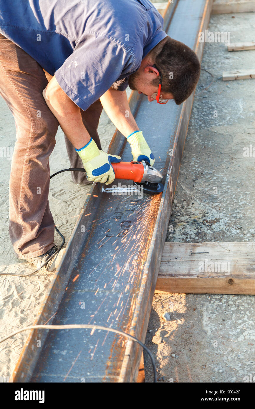 Cutting steel heavy industry by electric flex Stock Photo - Alamy