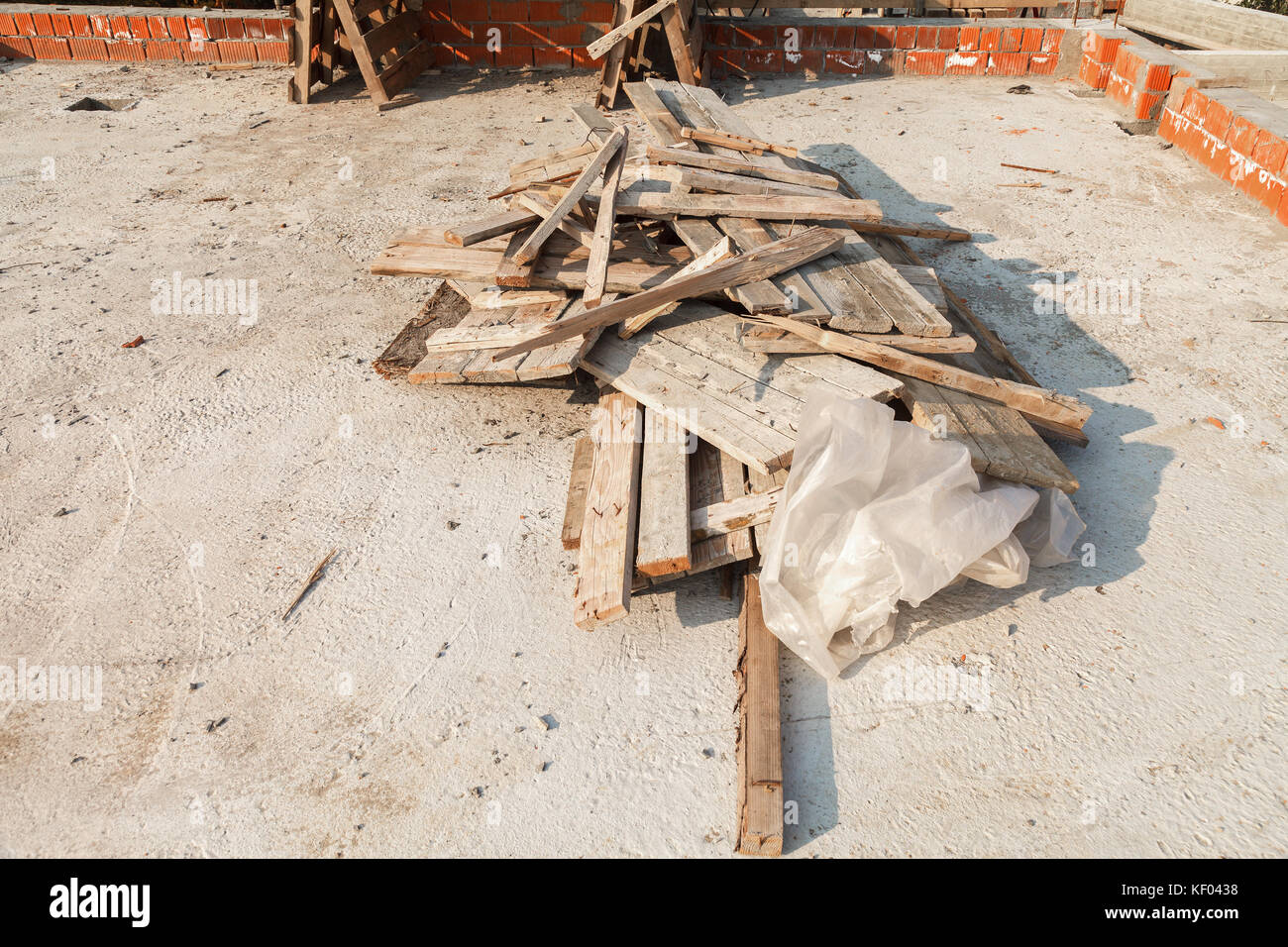 Construction waste on the roof of the house under construction ...