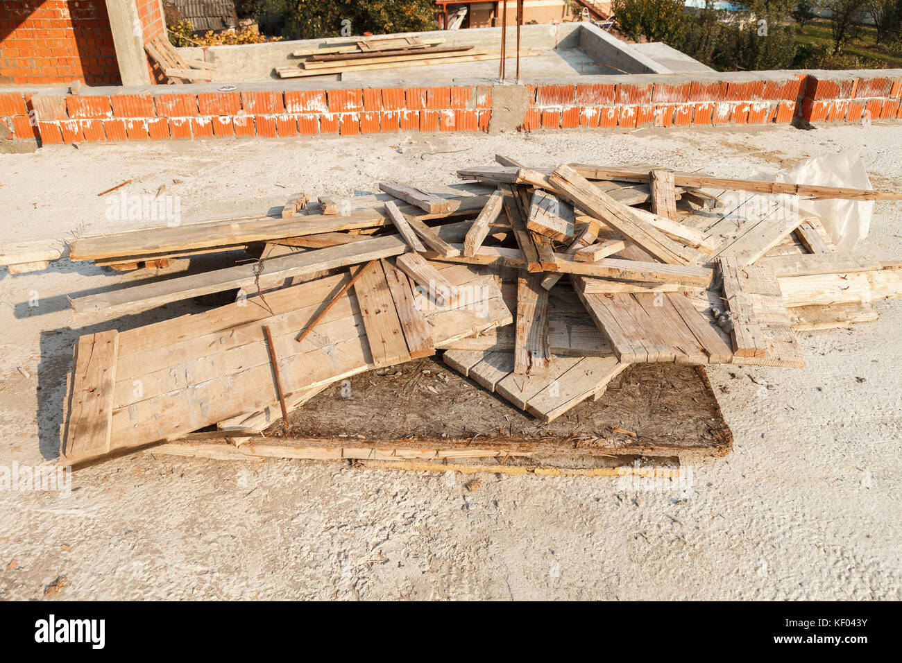 Construction waste on the roof of the house under construction ...