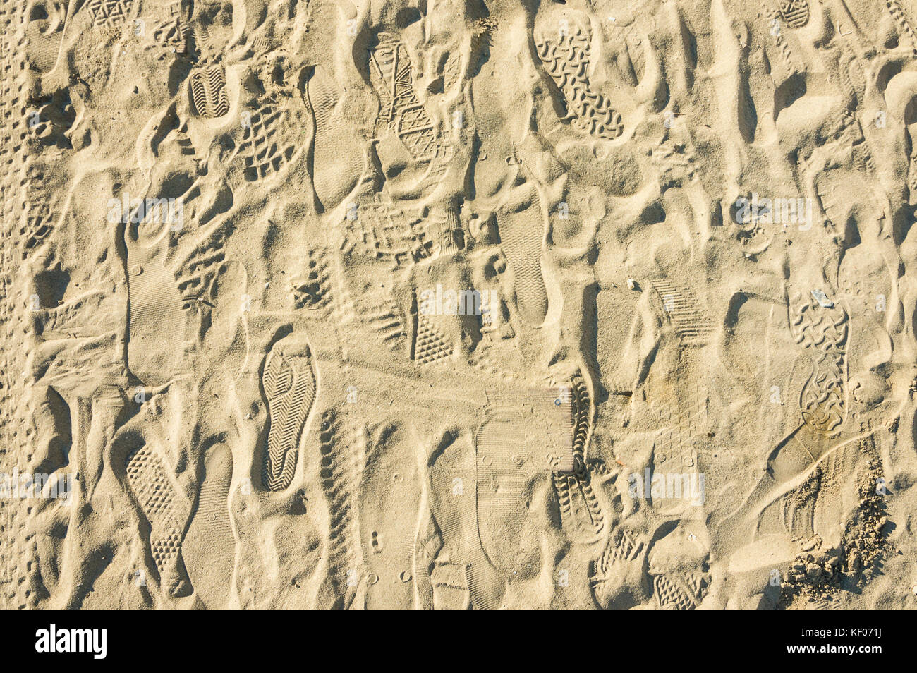 Detail of a small piece of beach with footsteps Stock Photo - Alamy