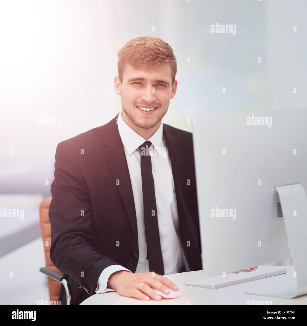 Successful business man at the workplace Stock Photo - Alamy