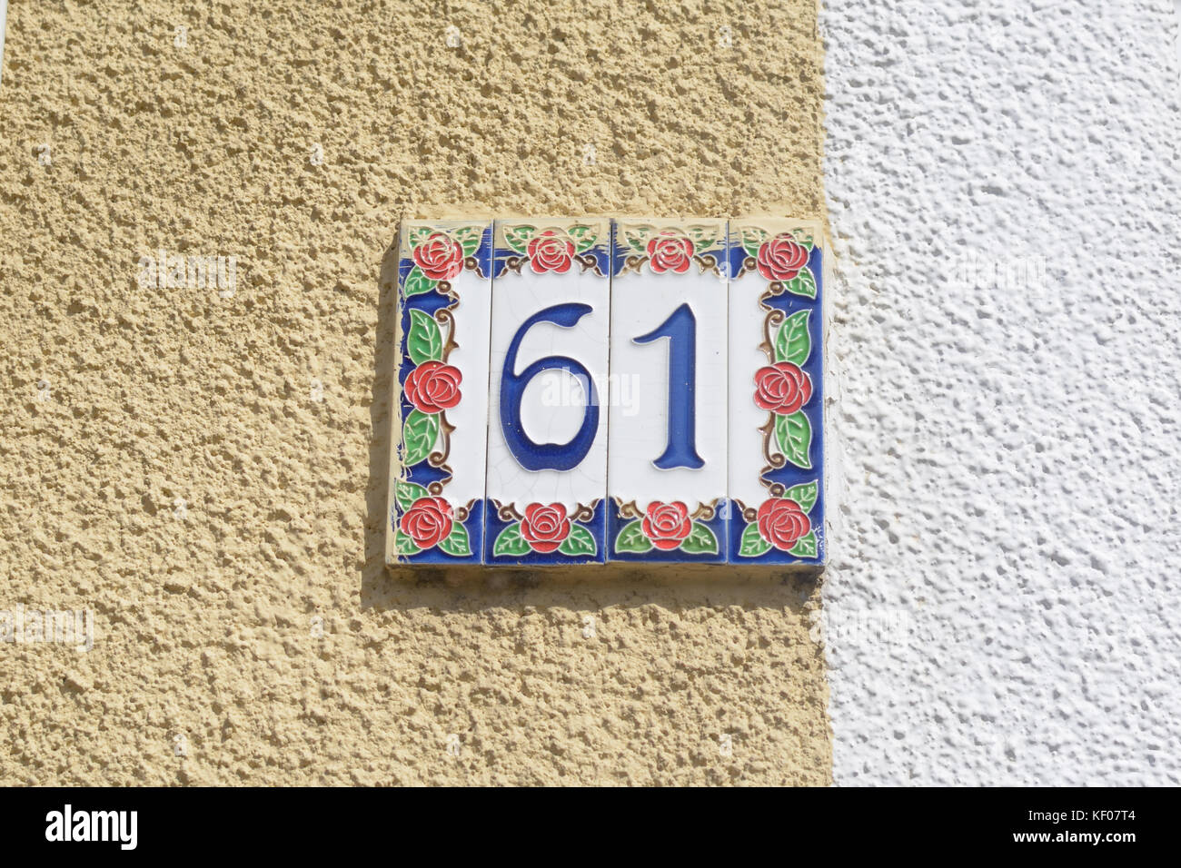 House number 61 sign in ceramic tiles Stock Photo - Alamy
