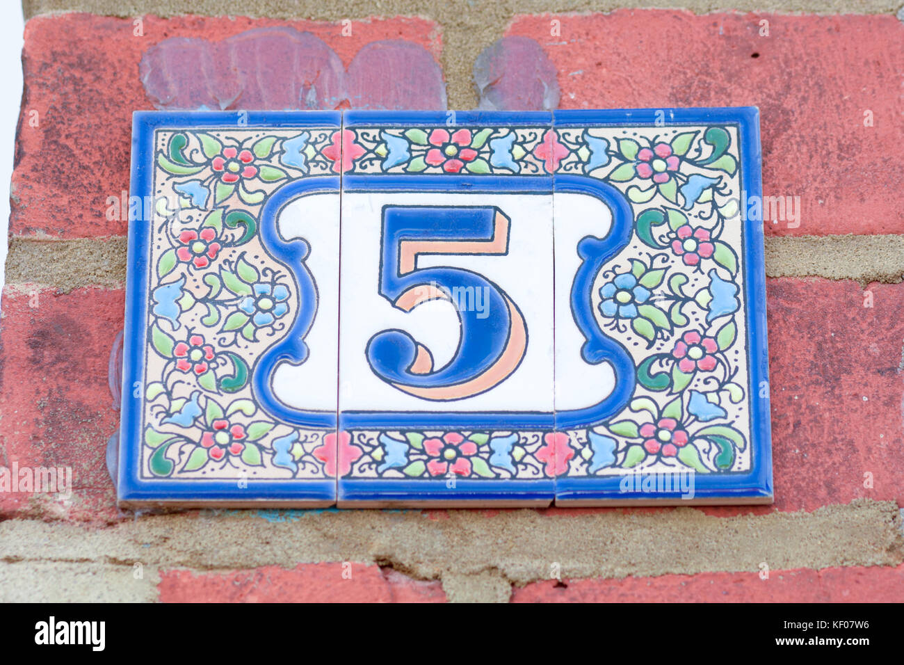 House number 5 sign in ceramic tiles on wall Stock Photo - Alamy