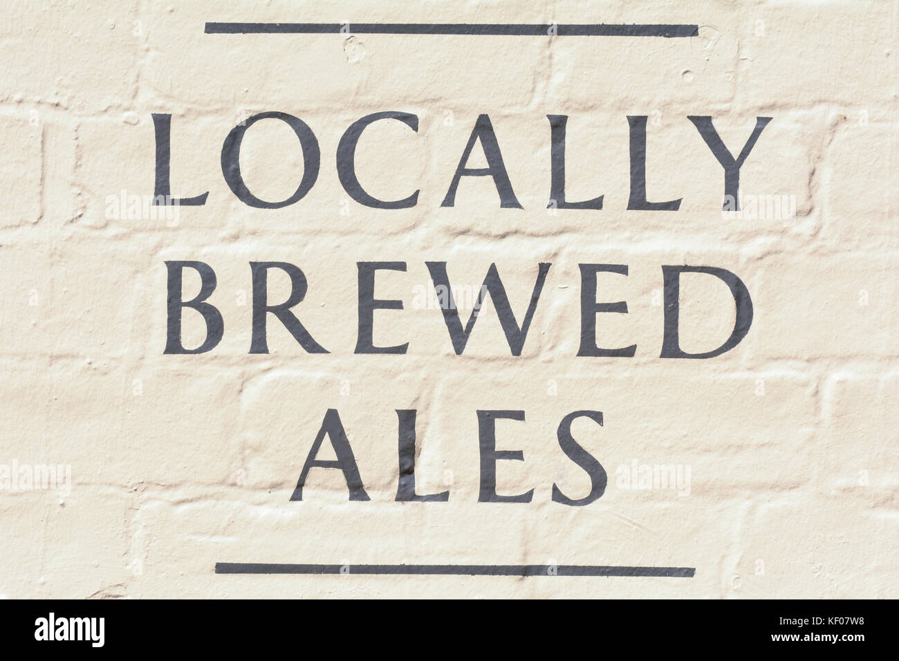 LOcally Brewed Ales - sign painted on wall outside public house Stock ...