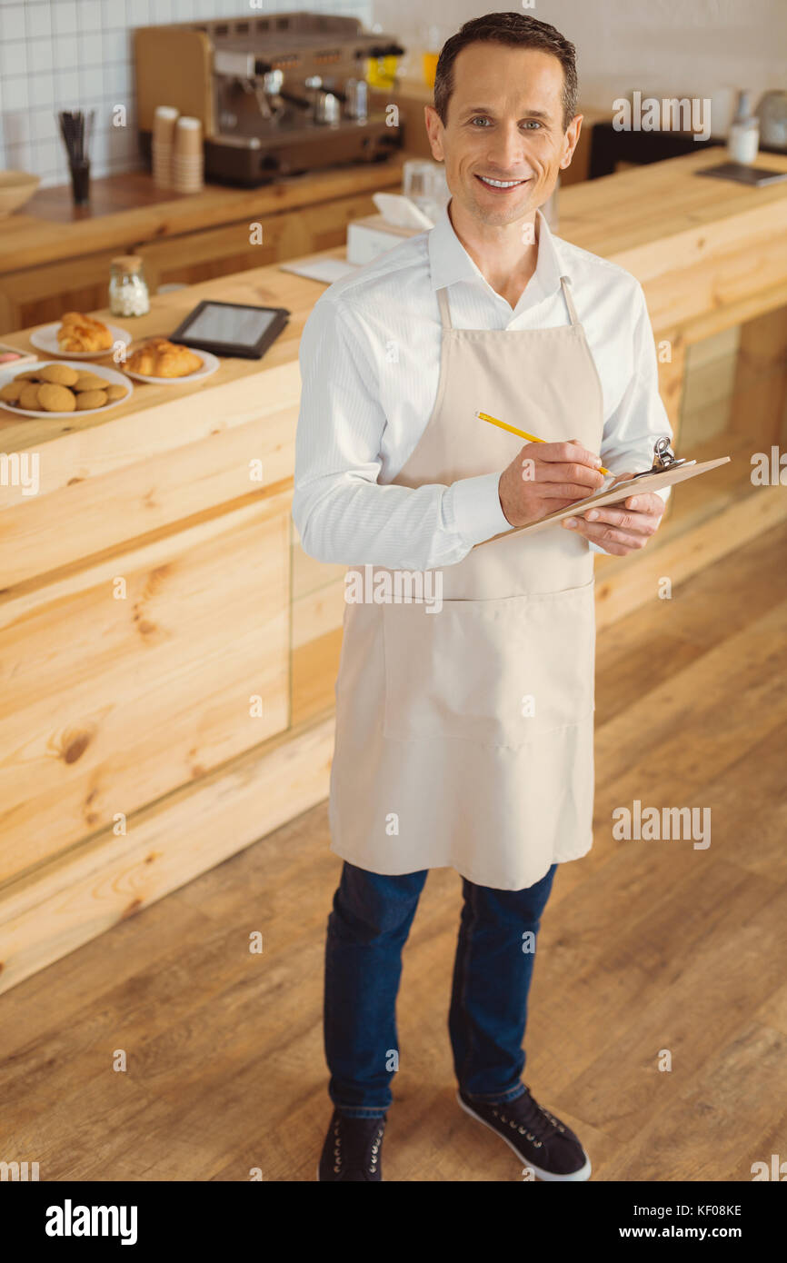 Happy cheerful man being at work Stock Photo - Alamy