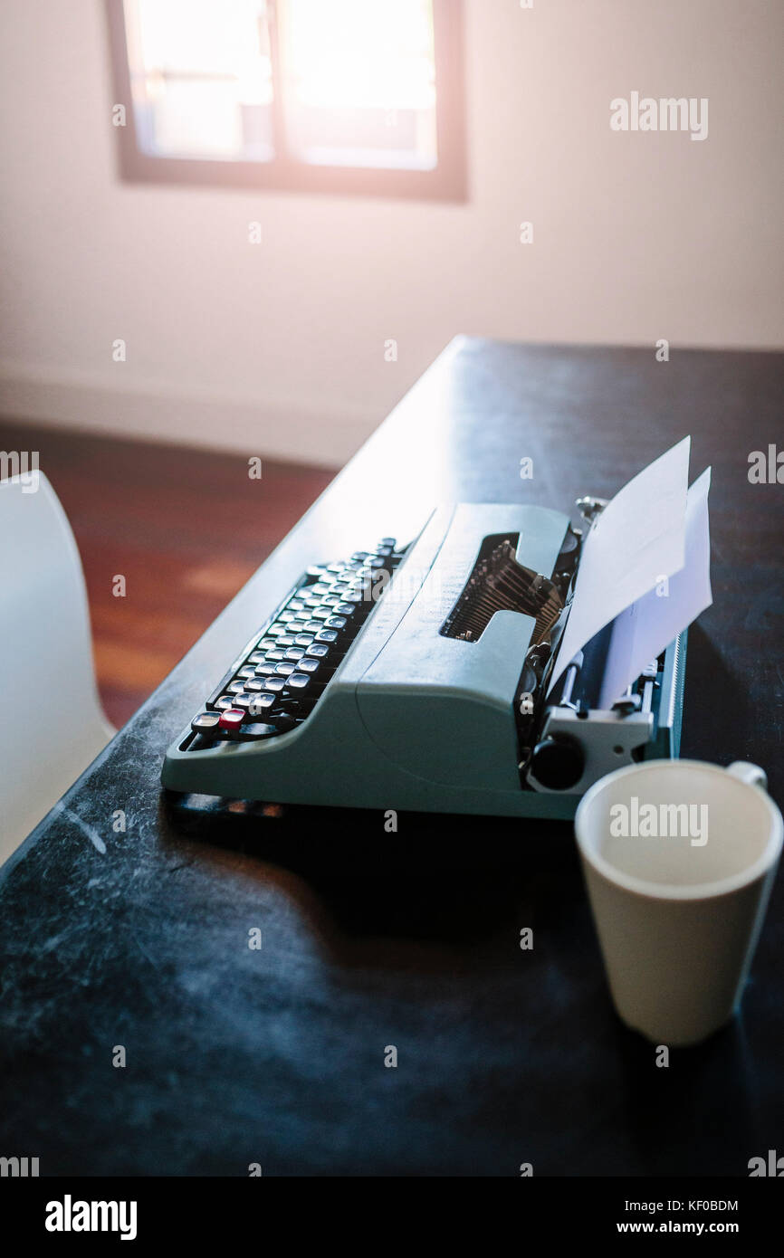 Typewriter on desk Stock Photo - Alamy