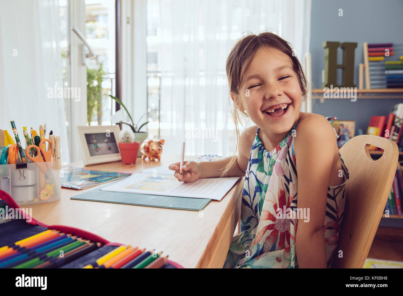 Schoolgirl doing schoolwork in hi-res stock photography and images - Alamy