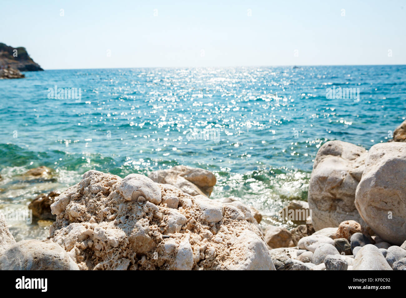 waves break against the rocks Stock Photo - Alamy
