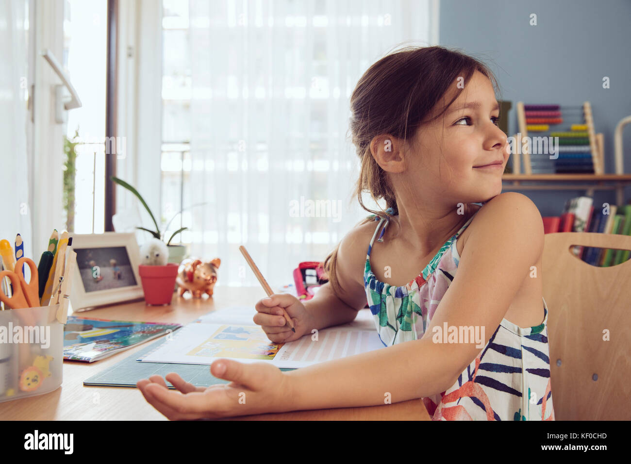 Doing schoolwork at home hi-res stock photography and images - Alamy