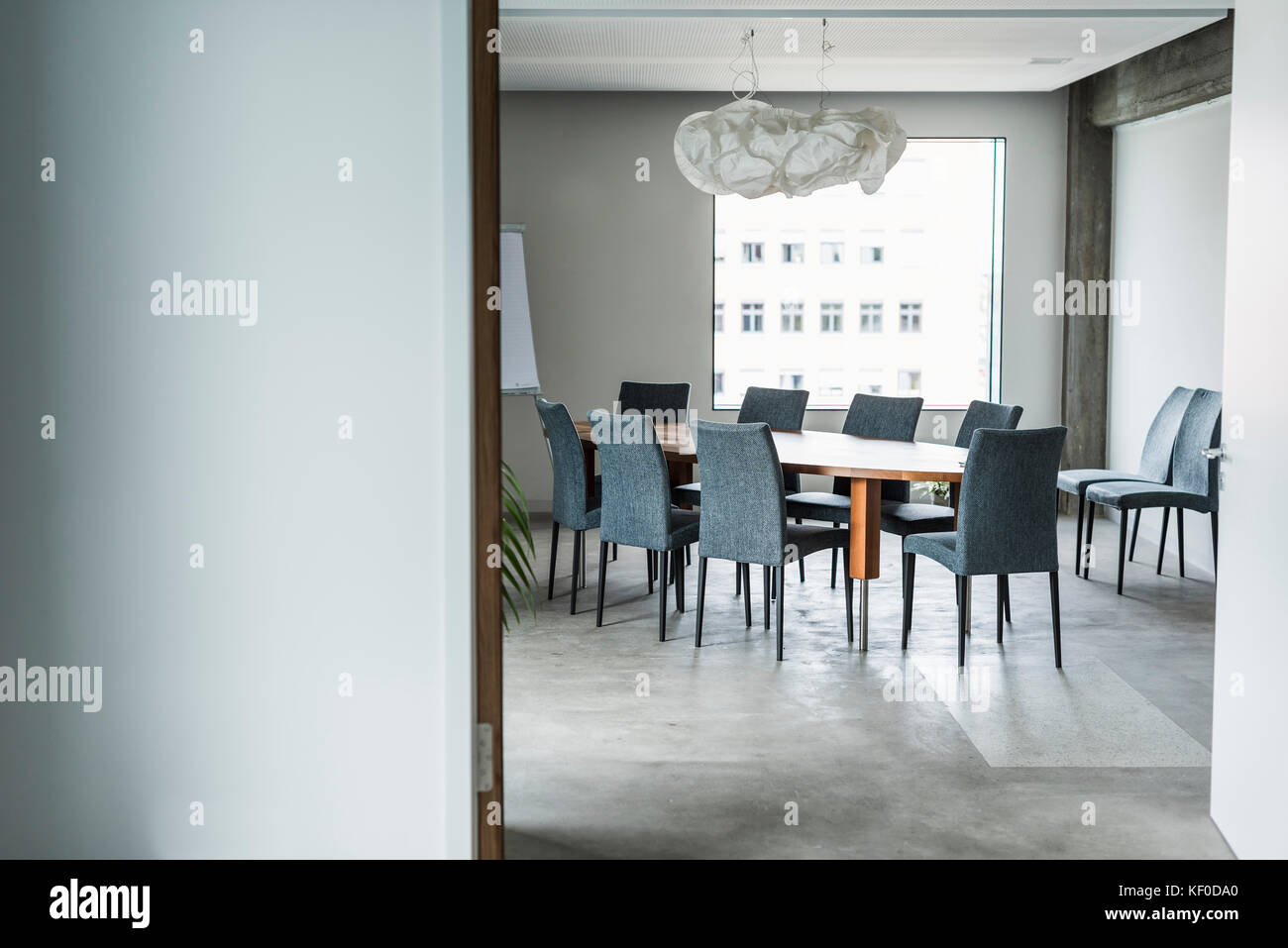 Empty boardroom with flipchart Stock Photo - Alamy