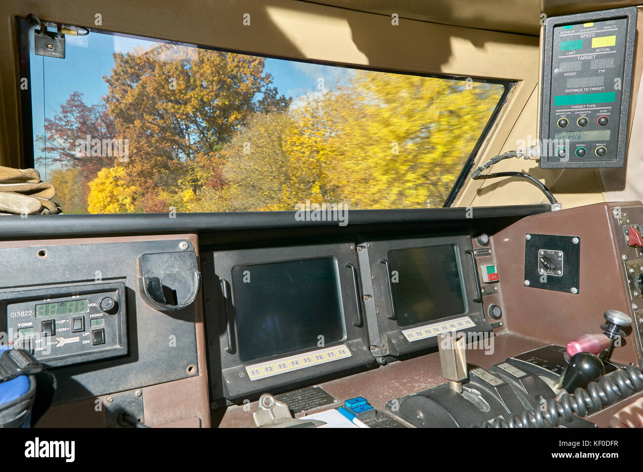 Interior view of the inside of a locomotive cab with many switches and ...