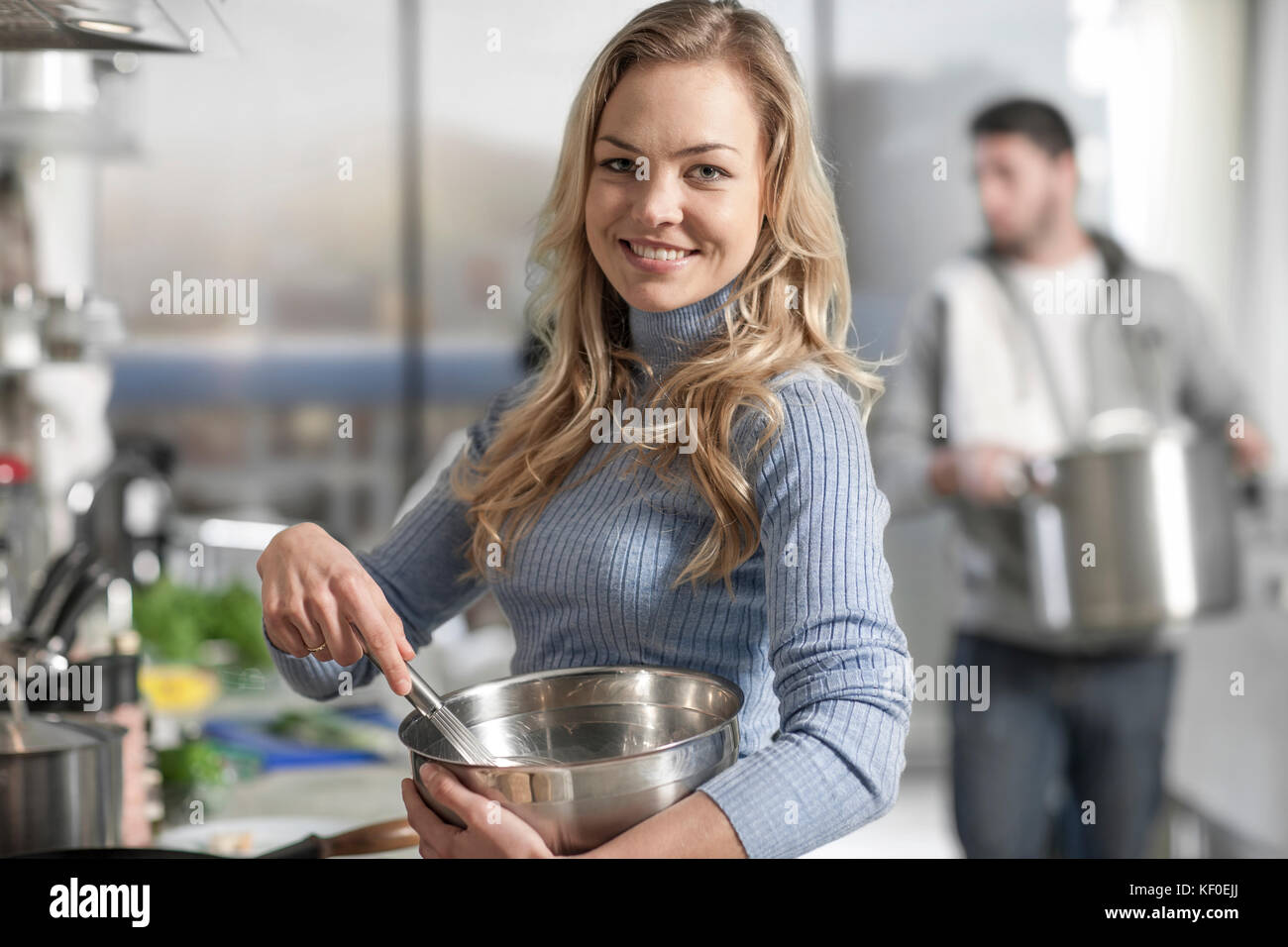Woman stirring kitchen africa hi-res stock photography and images - Alamy
