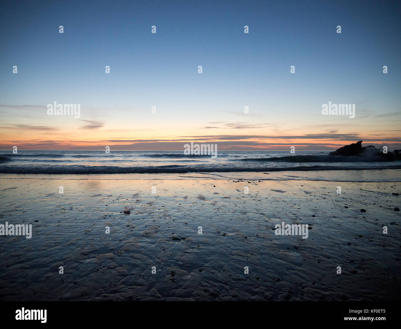 Wet beach sky sunset beach hi-res stock photography and images - Alamy