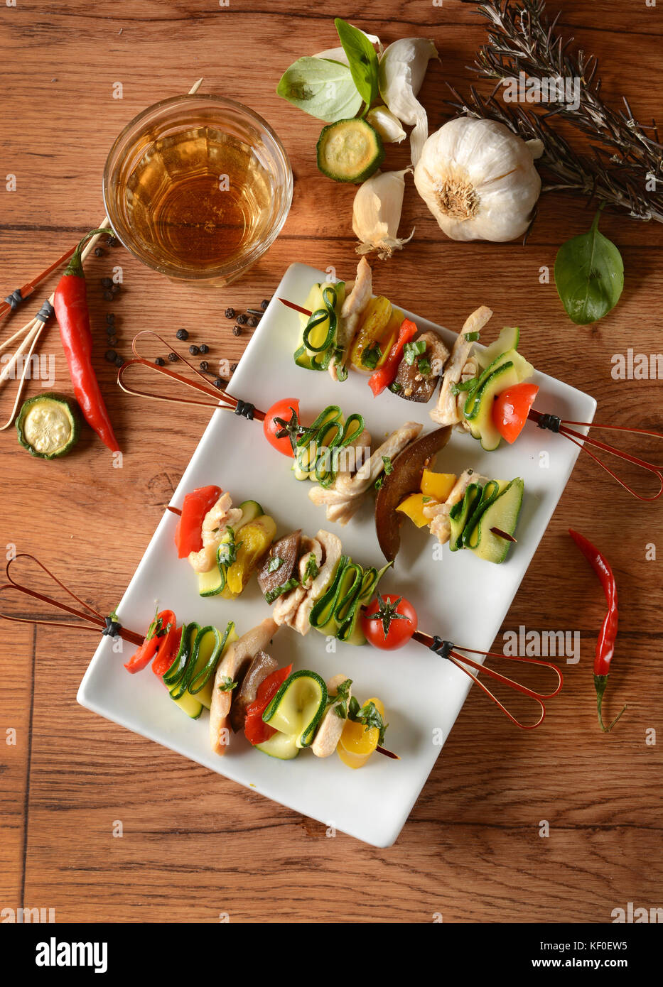 Chicken skewers with assorted vegetables - closeup Stock Photo - Alamy