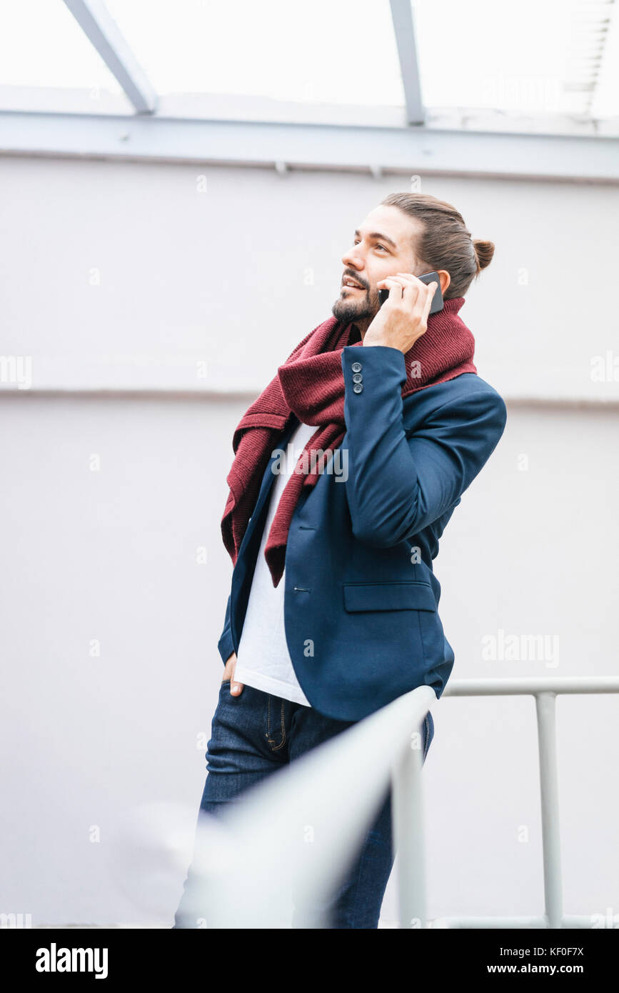 Portrait of smiling businessman on the phone Stock Photo - Alamy