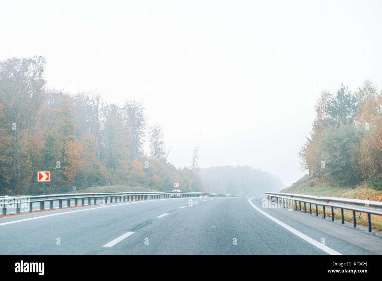 Highway with fog on highway, nature and traffic Stock Photo - Alamy