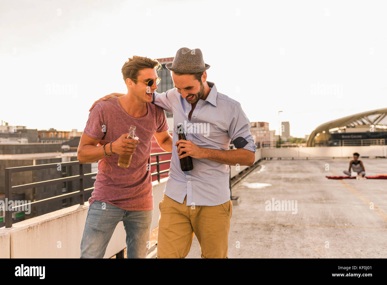 Two friends drinking on rooftop hi-res stock photography and images - Alamy