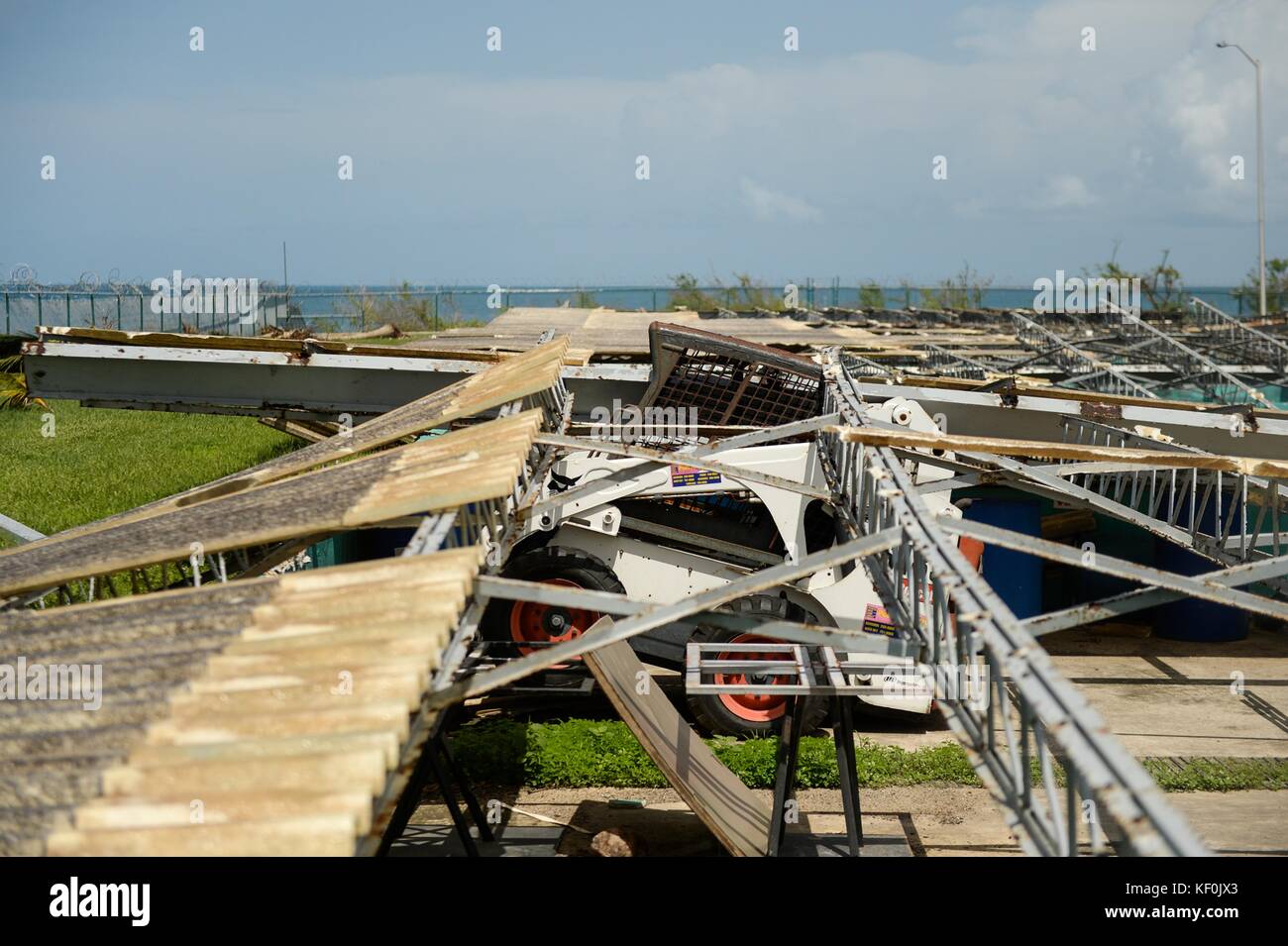 U.S. Army soldiers clean up damage to a water treatment facility during ...