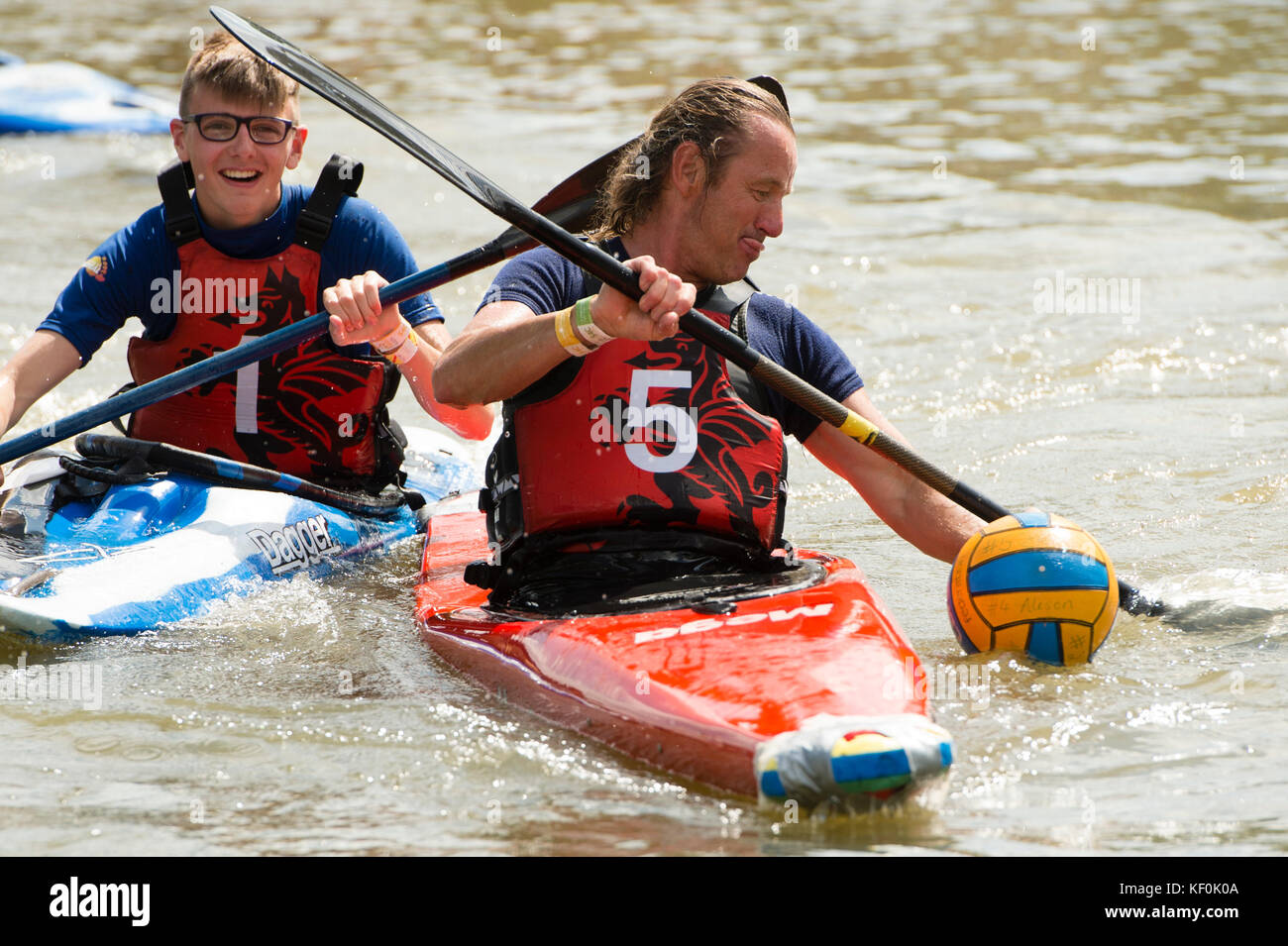 People kayaking polo on the lake at the Royal Welsh Agricultural Show ...