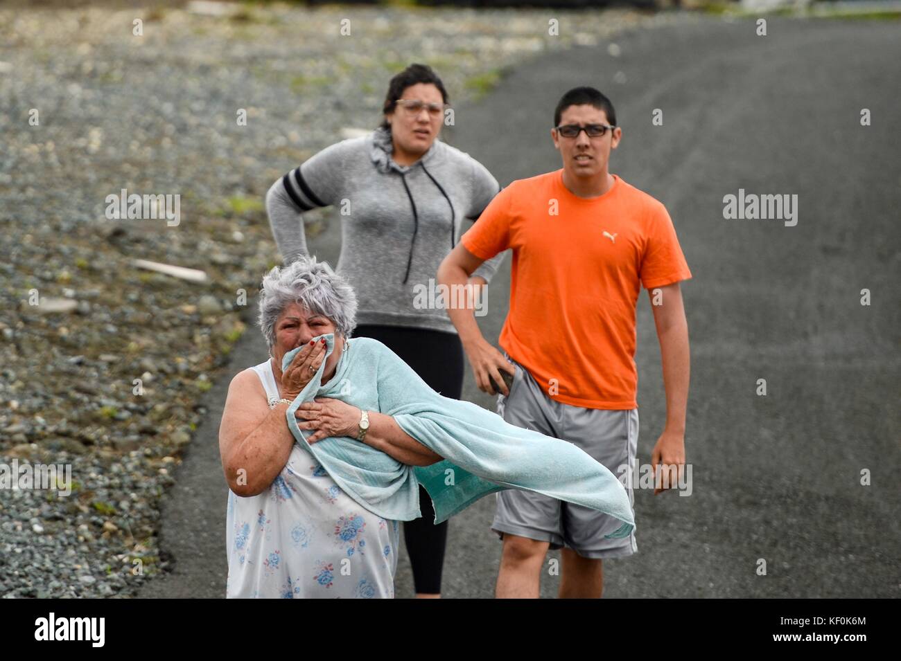 U.S. Customs and Border Protection officers deliver water and emergency ...