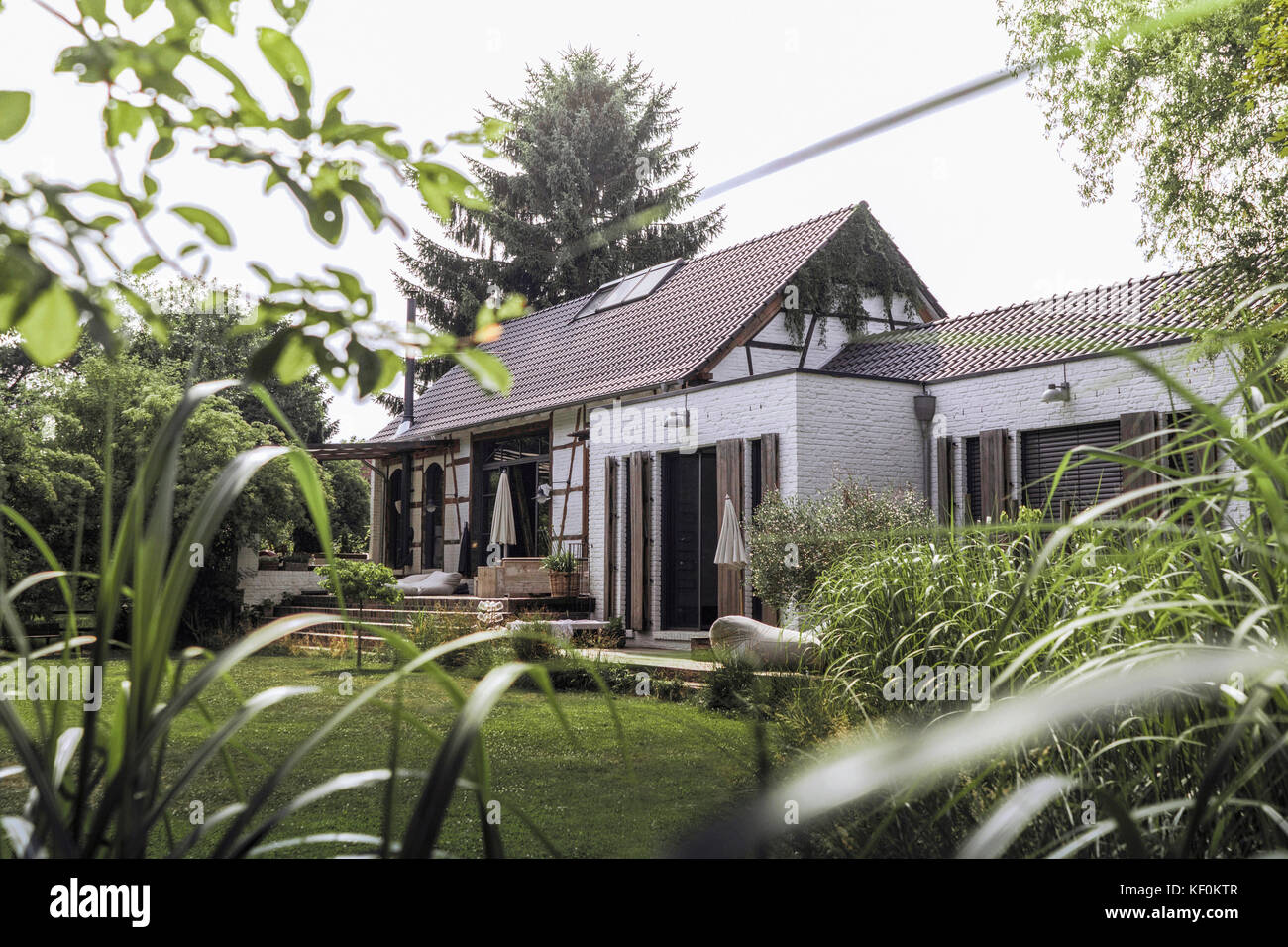 Germany, Country house with garden Stock Photo - Alamy