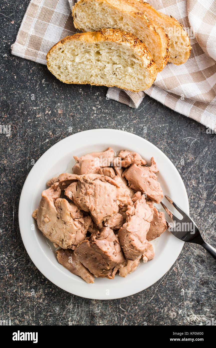 Cod liver in oil on plate Stock Photo - Alamy
