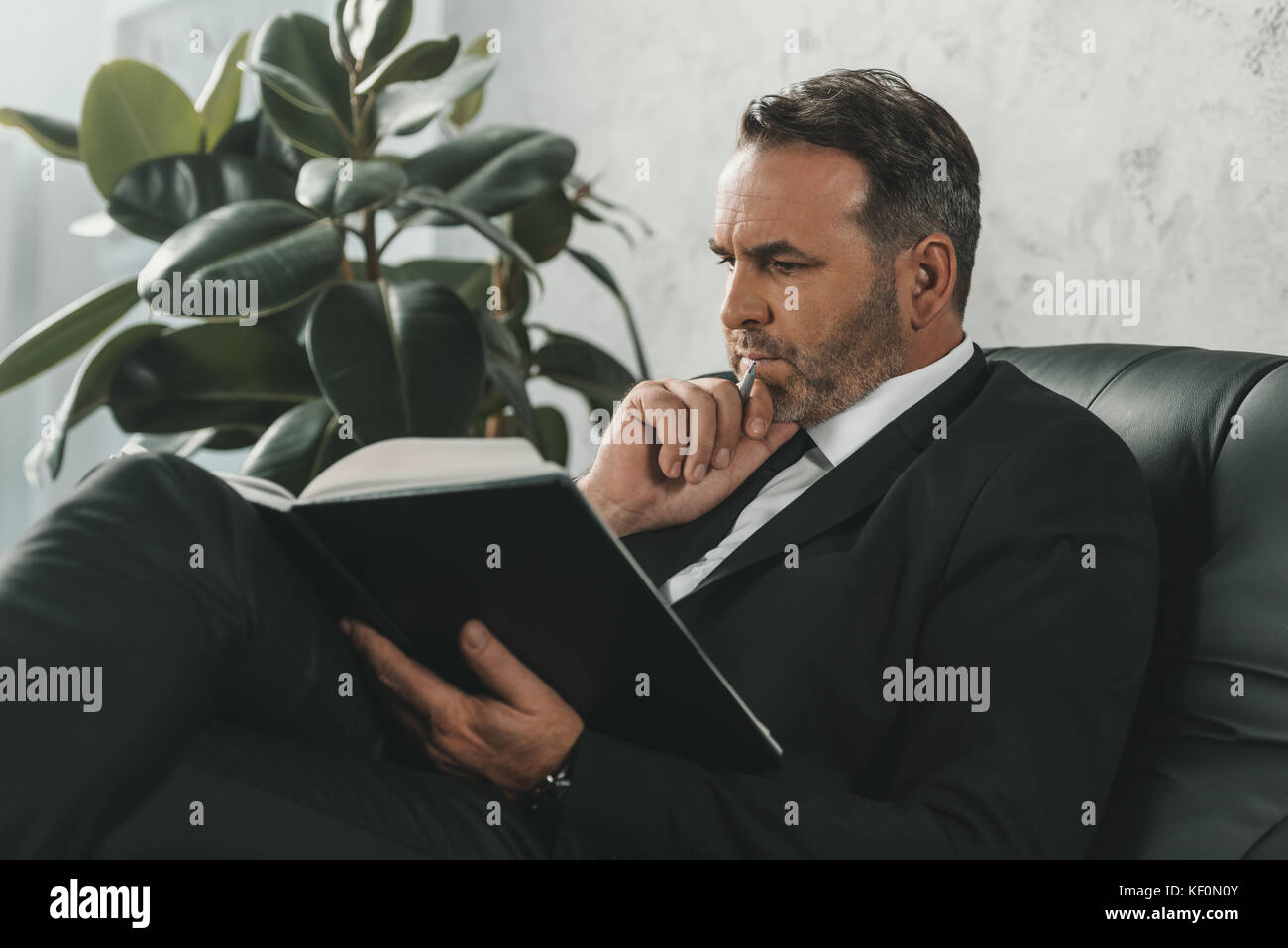 businessman reading book Stock Photo - Alamy