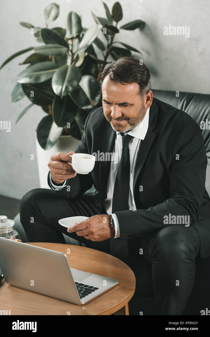 Person drinking tea cup teapot hi-res stock photography and images - Alamy