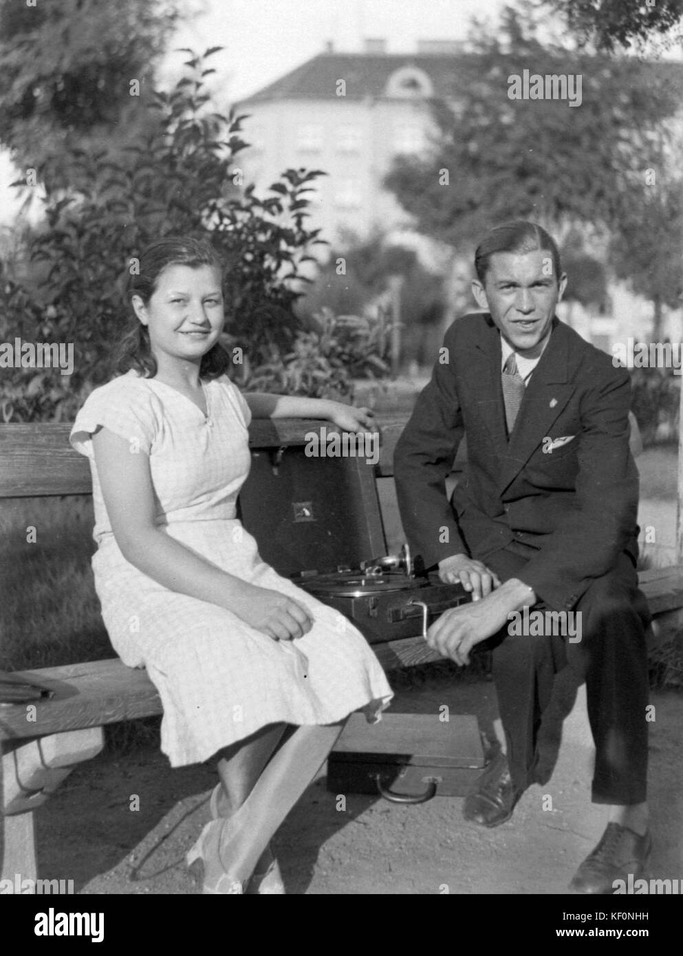 Gramophone, bench, man and woman 19569 Stock Photo - Alamy