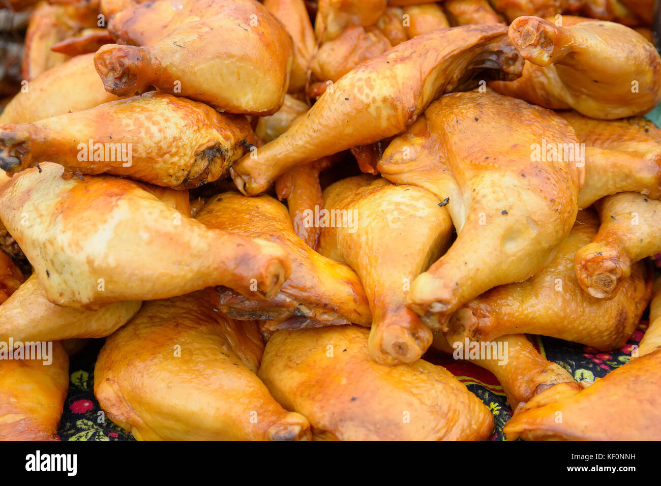 Close up cooked chicken legs in shop Stock Photo - Alamy