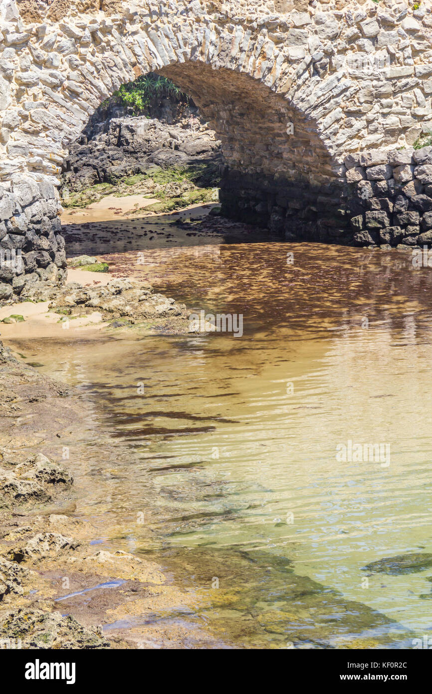 Historic rock bridge in Cascais, Portugal Stock Photo - Alamy