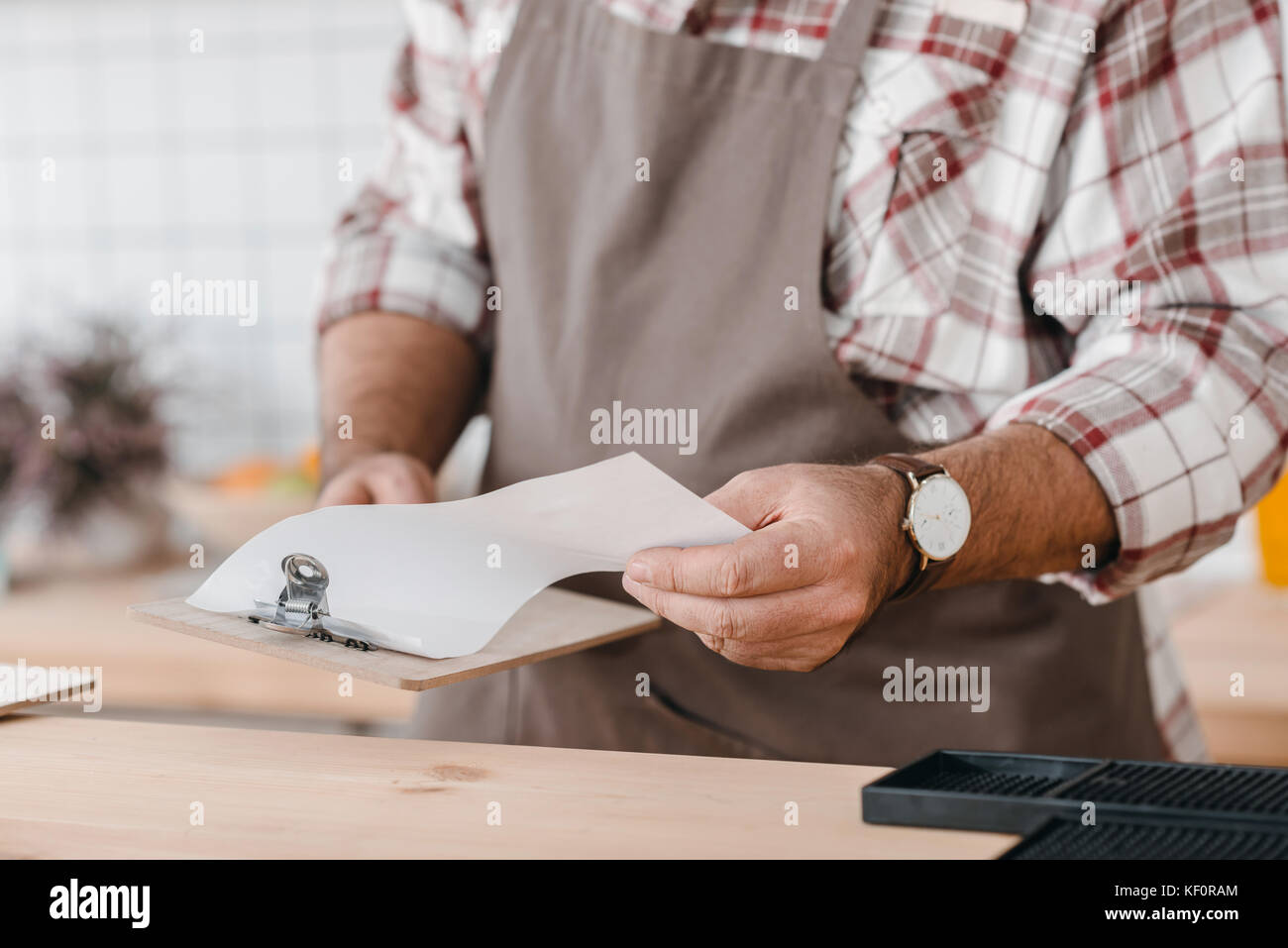 Checking paper hi-res stock photography and images - Alamy