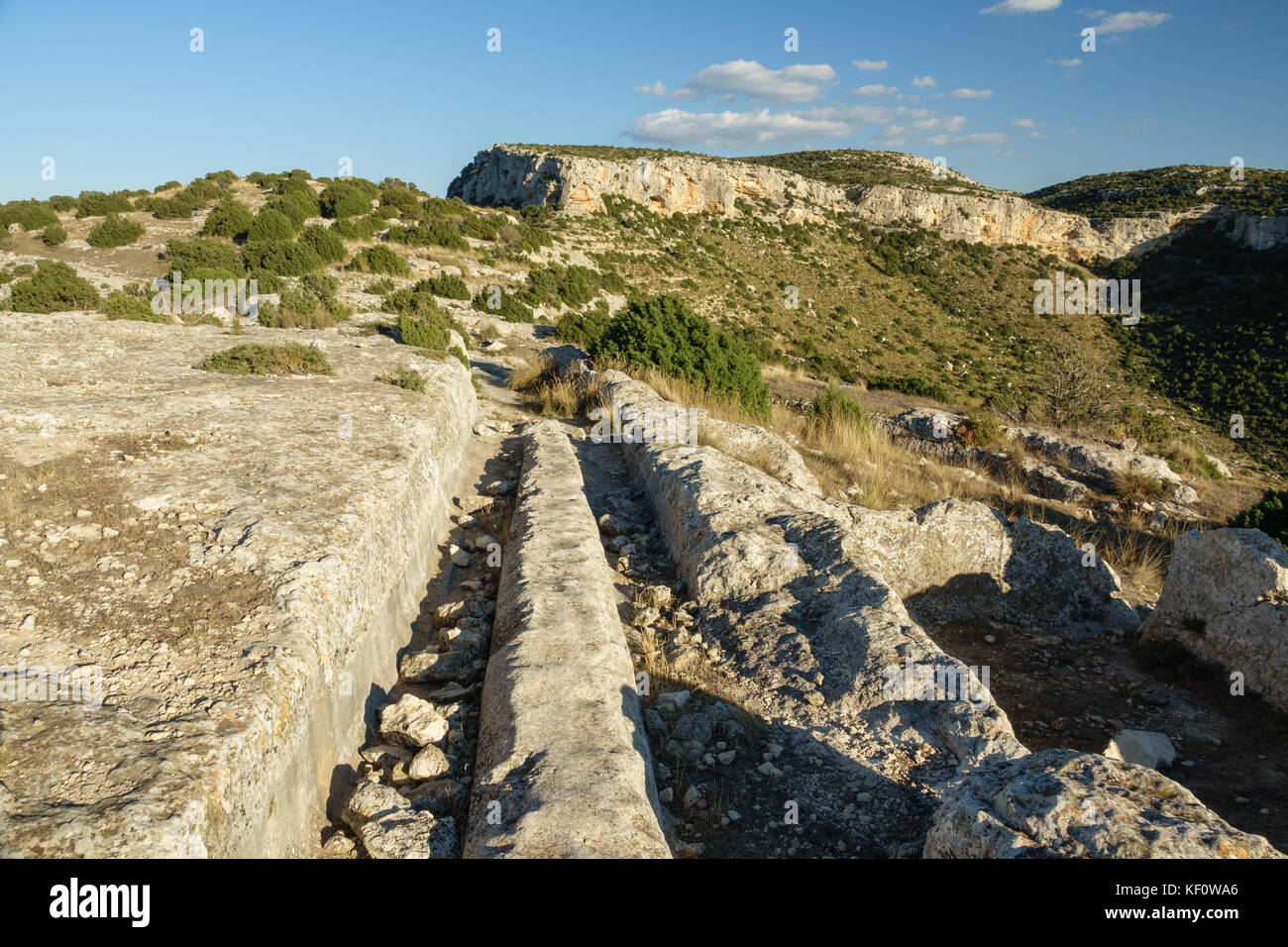 Deep wheel marks over rocks from ancient civilization Stock Photo - Alamy