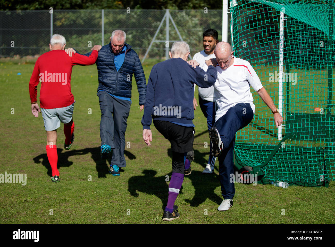 Walking football elderly people hi-res stock photography and images - Alamy