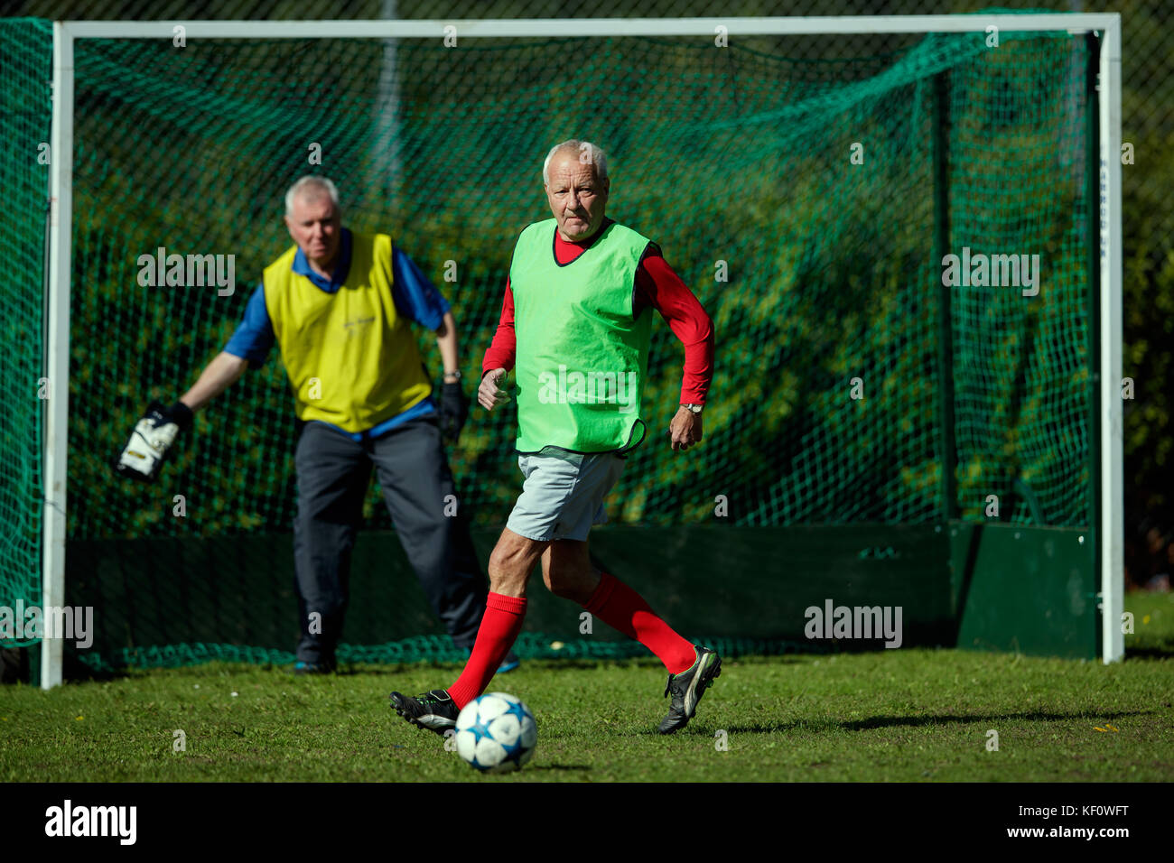 Walking football elderly people hi-res stock photography and images - Alamy