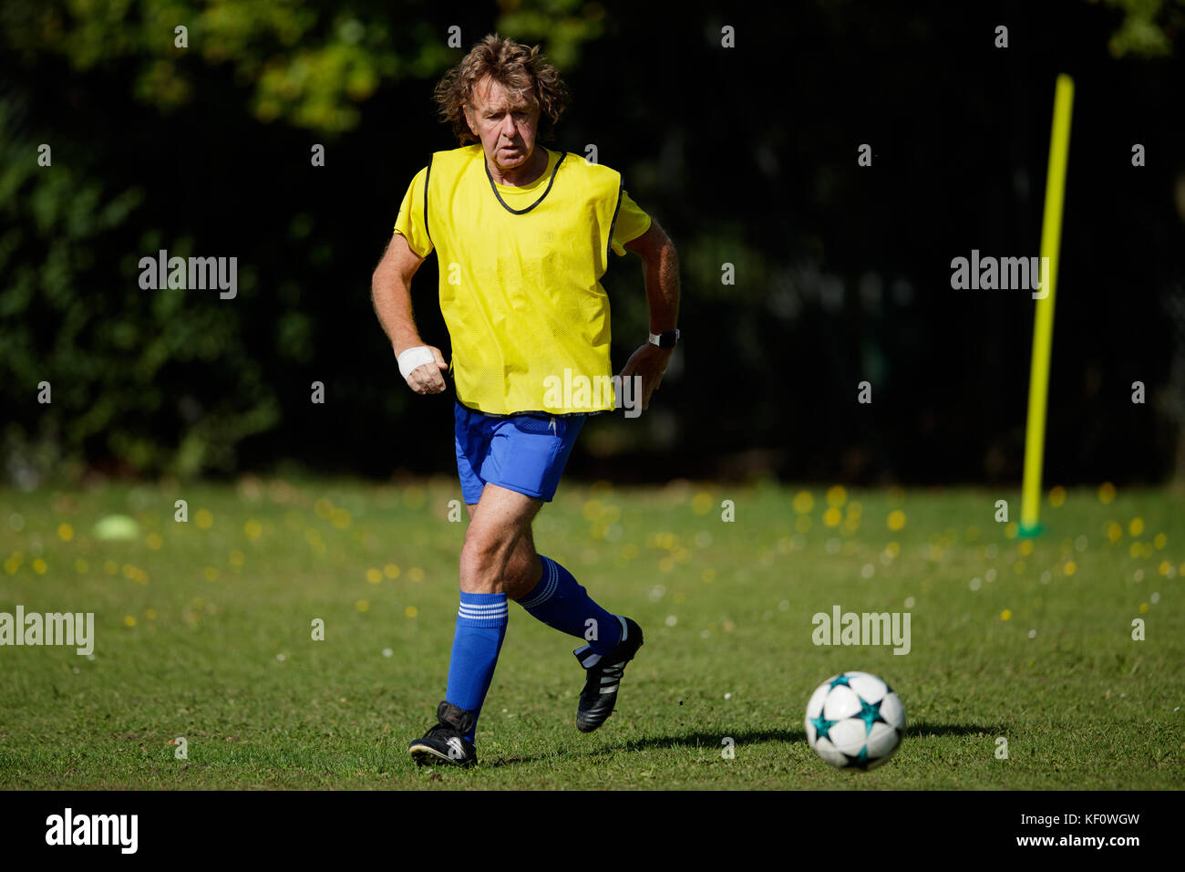 Senior citizen walking football hi-res stock photography and images - Alamy