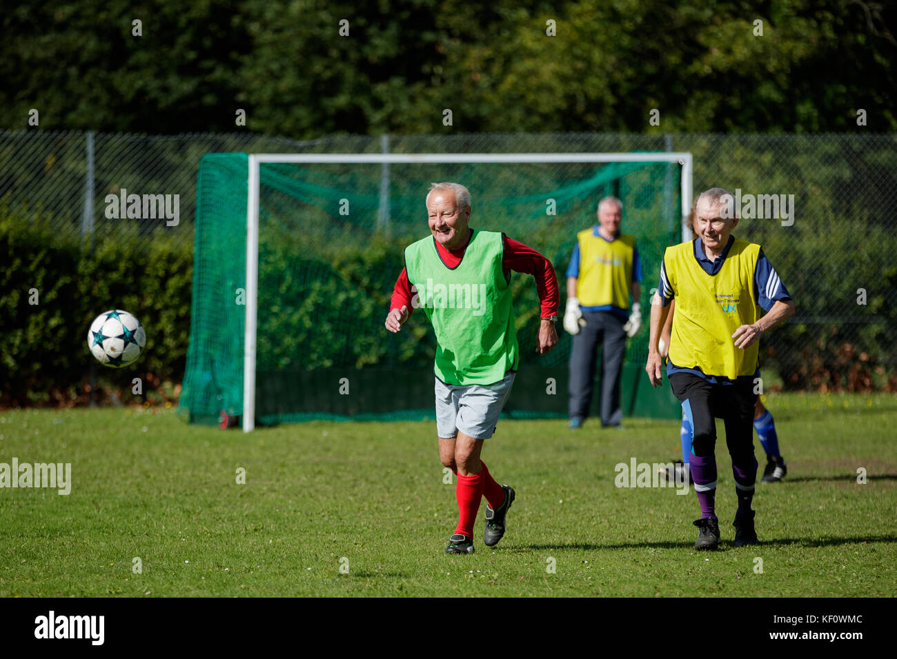 Walking football elderly people hi-res stock photography and images - Alamy