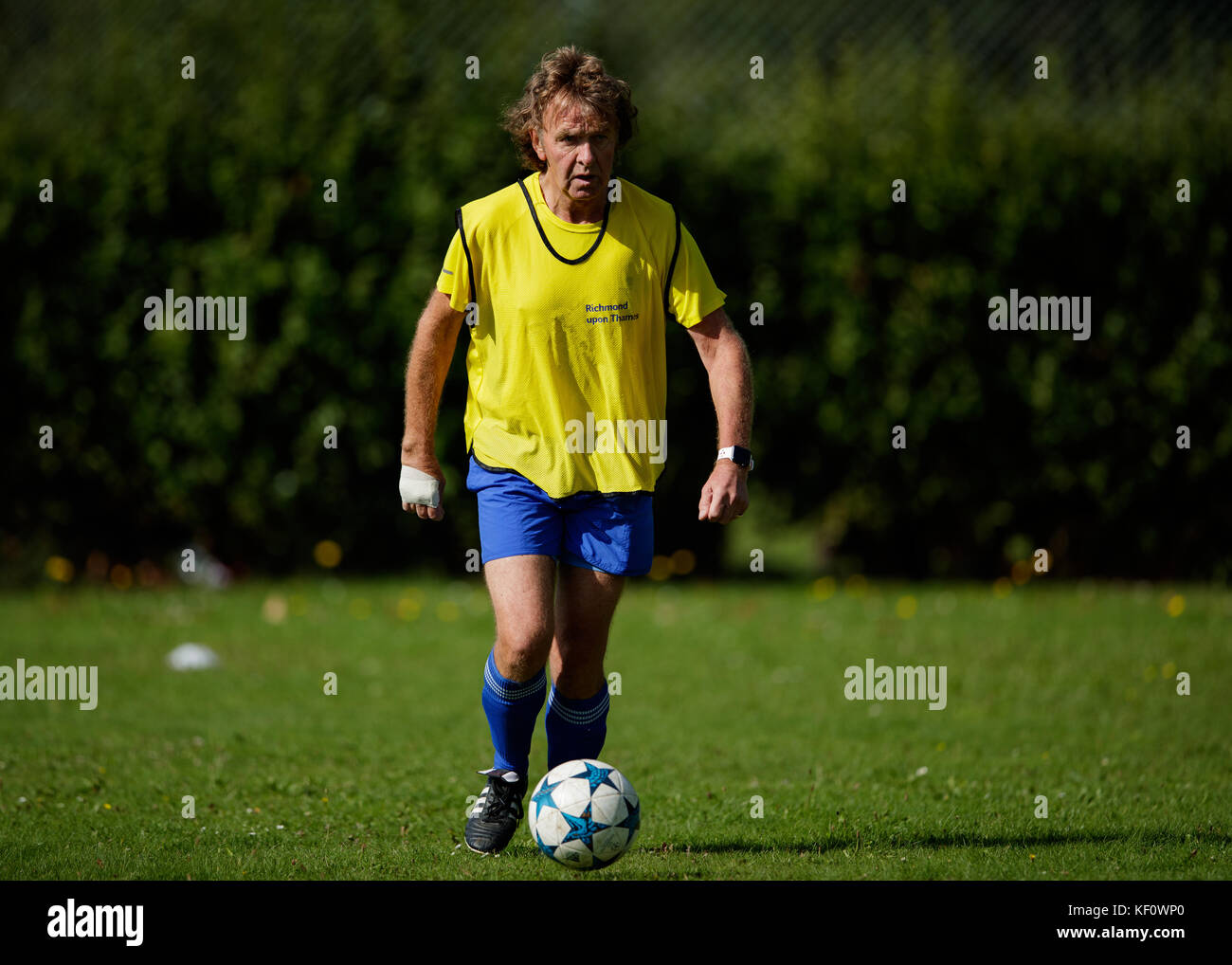 Walking football elderly people hi-res stock photography and images - Alamy