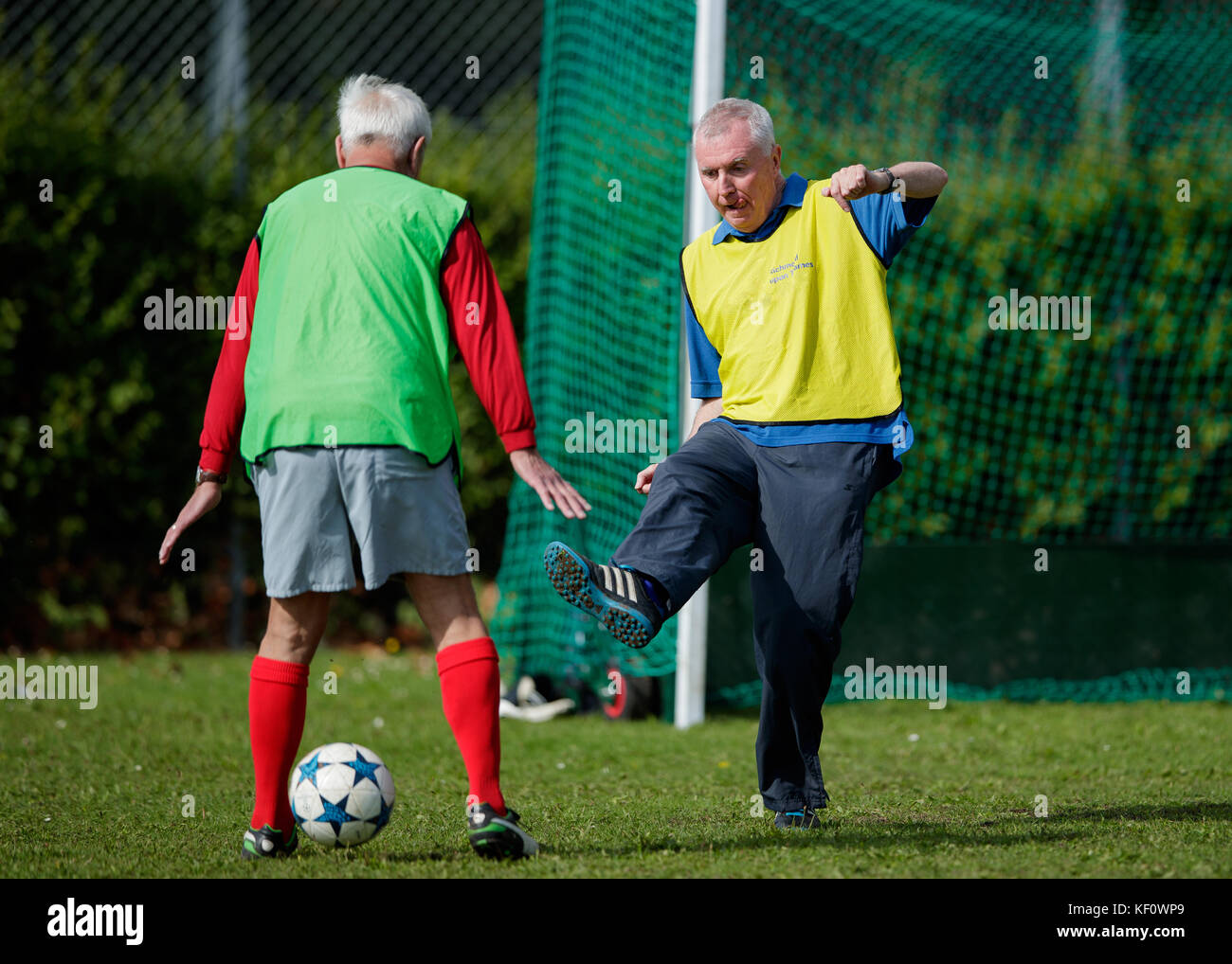 Walking football elderly people hi-res stock photography and images - Alamy