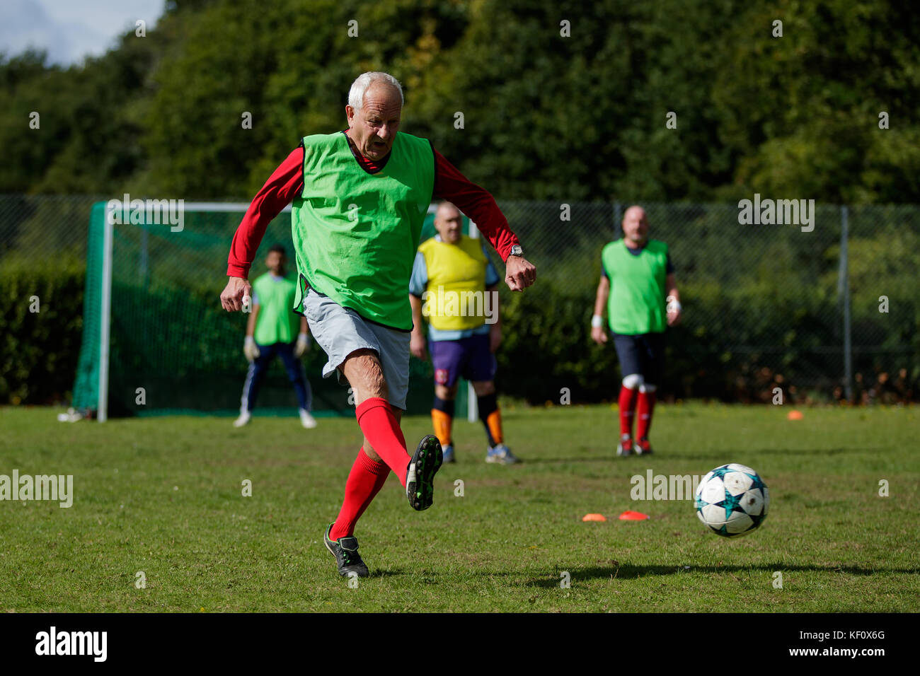 Senior citizen walking football hi-res stock photography and images - Alamy