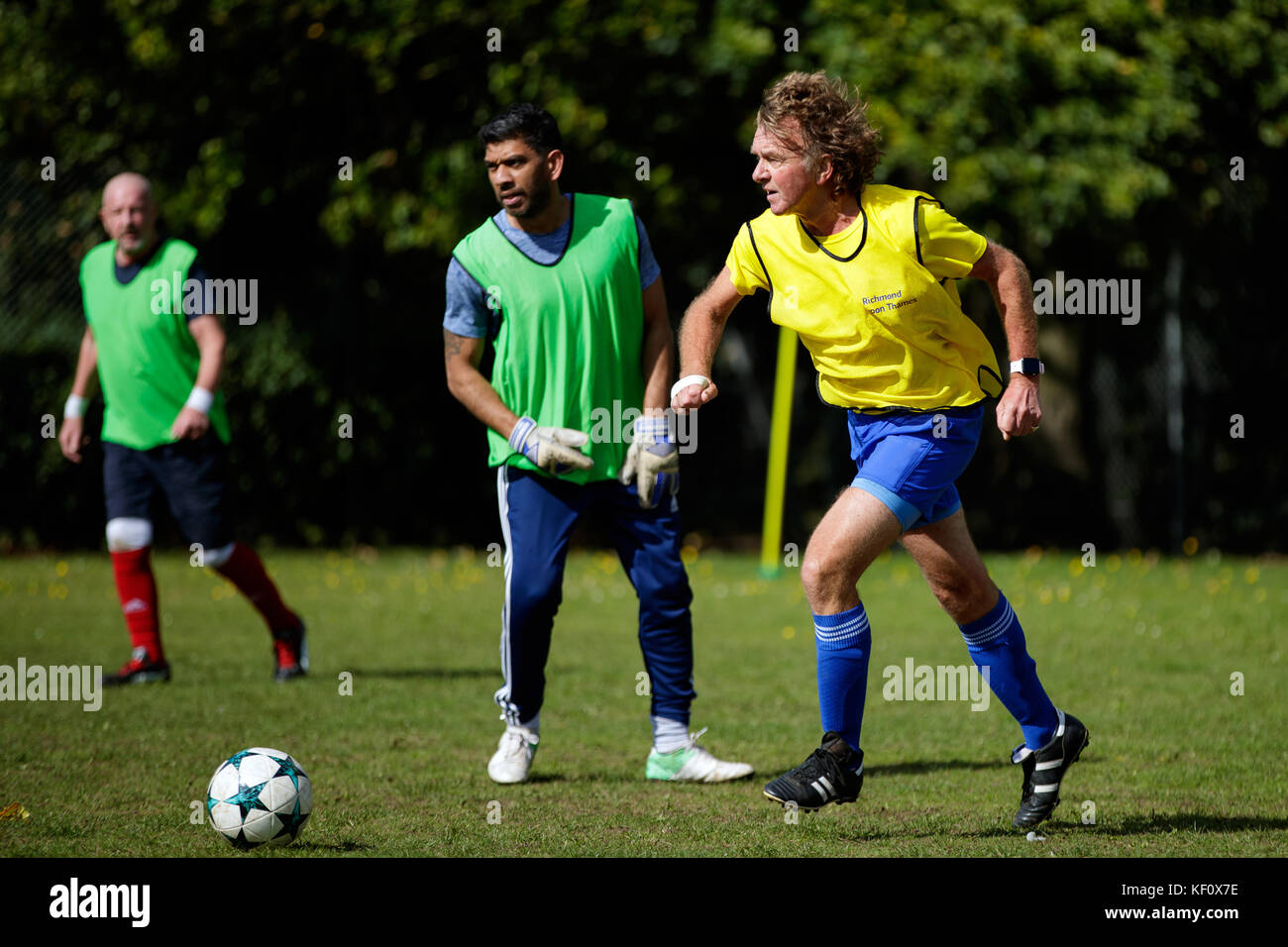 Men during a Senior walking football training session Stock Photo - Alamy