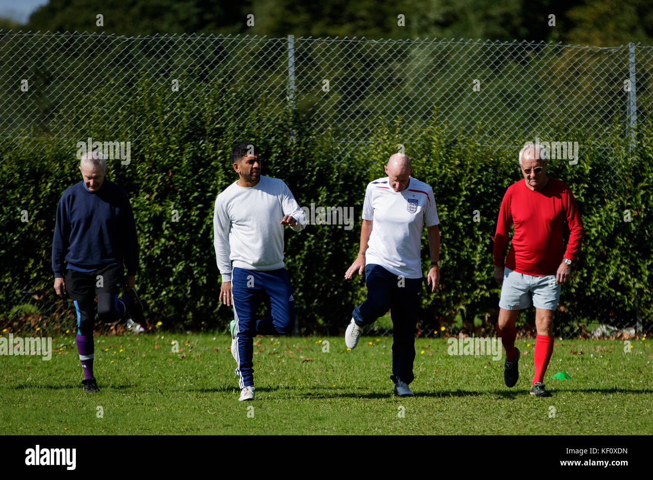 Men during a Senior walking football training session Stock Photo - Alamy