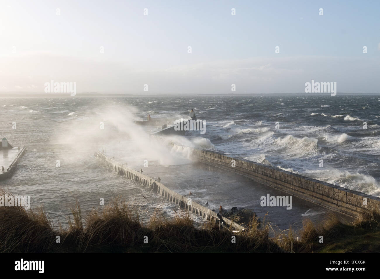 Burghead Harbour in Scotland being battered by huge waves, crashing ...