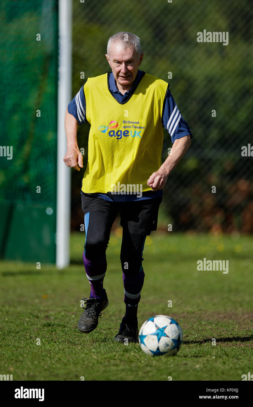 Senior citizen walking football hi-res stock photography and images - Alamy