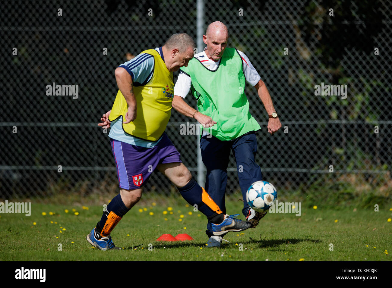 Senior citizen walking football hi-res stock photography and images - Alamy
