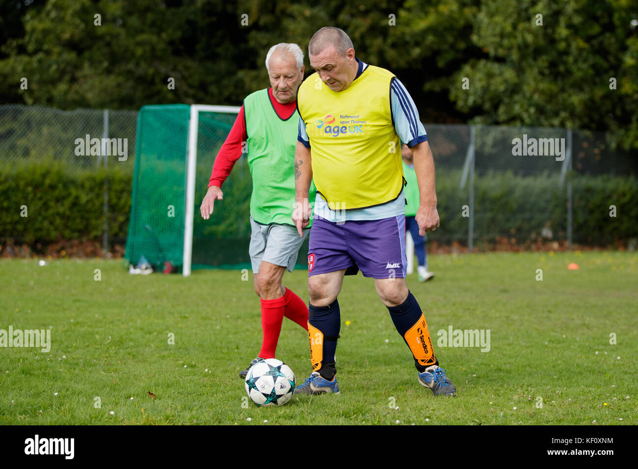 Senior citizen walking football hi-res stock photography and images - Alamy