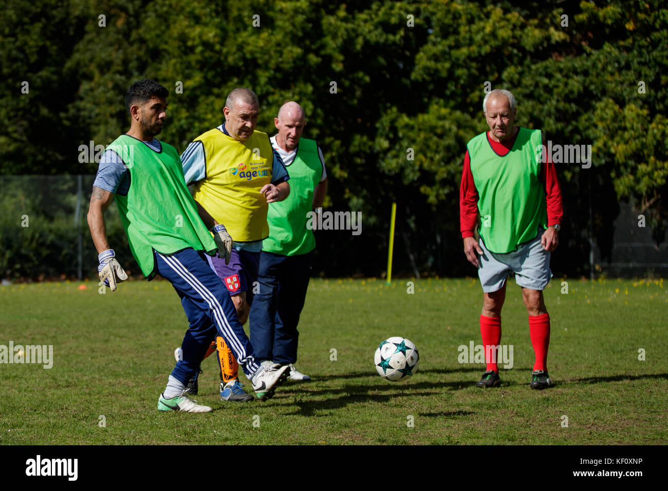 Men during a Senior walking football training session Stock Photo - Alamy