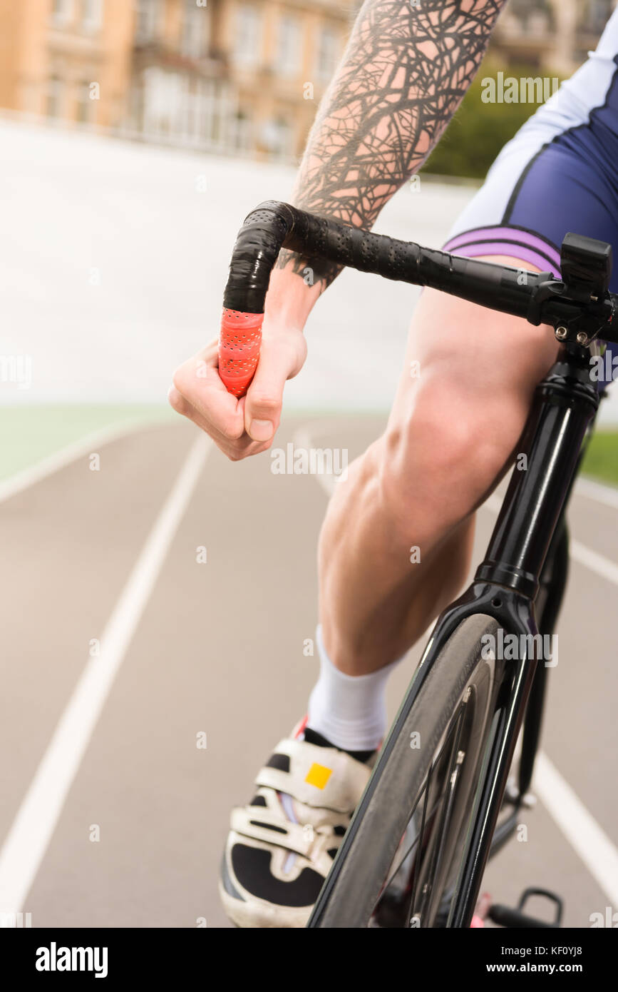 cyclist riding bicycle on cycle race track Stock Photo - Alamy
