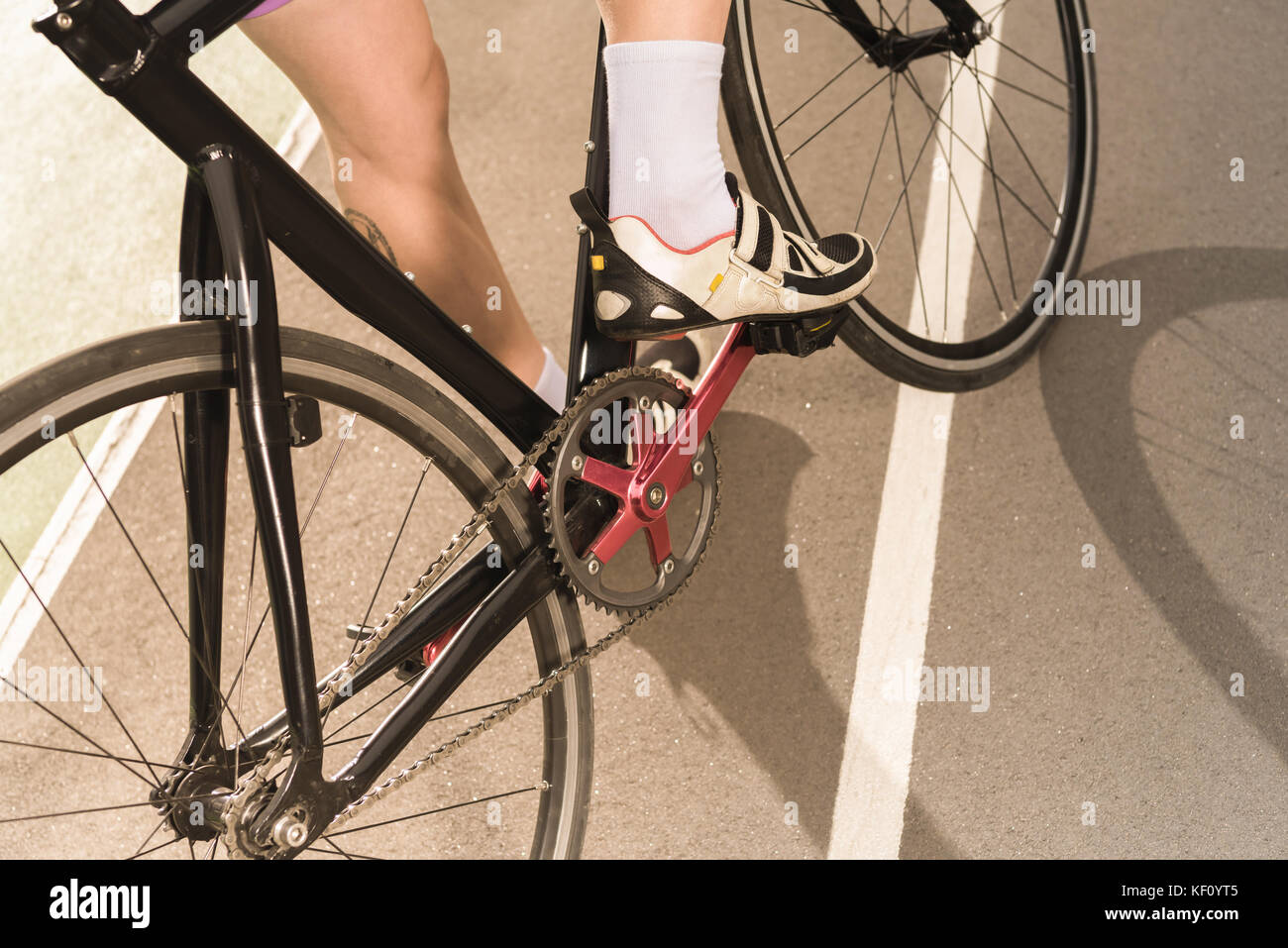 cyclist riding bicycle on cycle race track Stock Photo - Alamy
