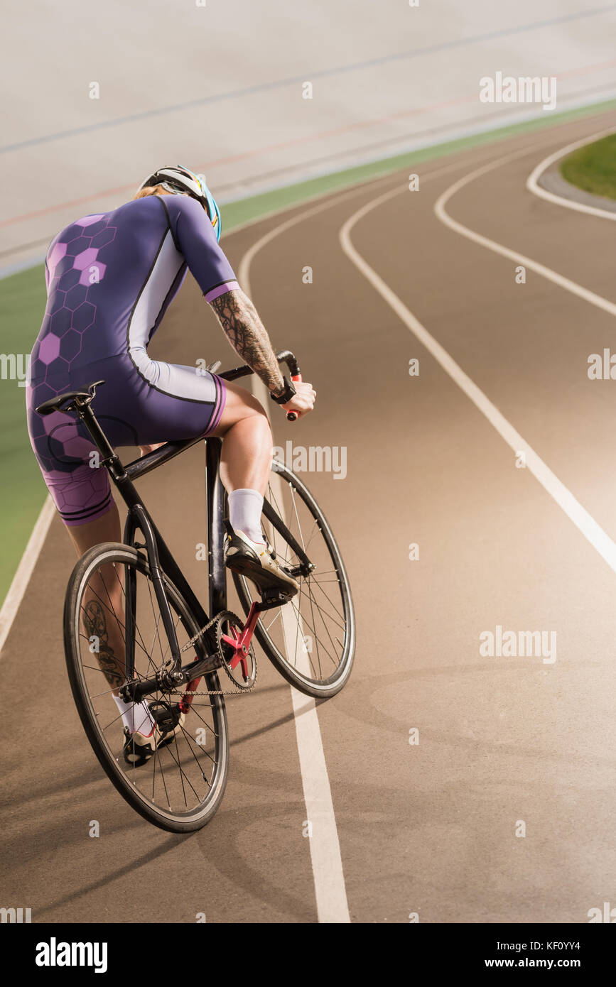 cyclist riding bicycle on cycle race track Stock Photo - Alamy